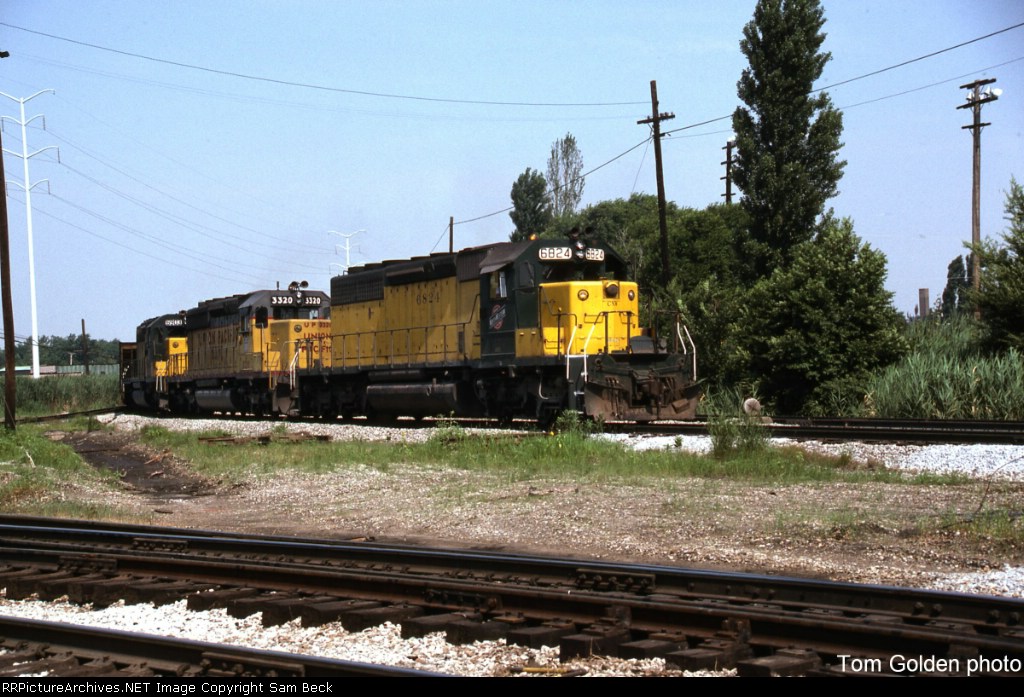 CNW 6824, UP 3320, and CNW 6903